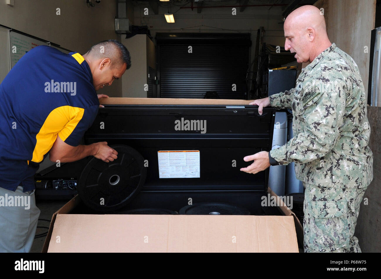 160518-N-ET019-153 SANTA RITA, Guam (May 18, 2016) Command Master Chief Dennis Polli, assigned ...