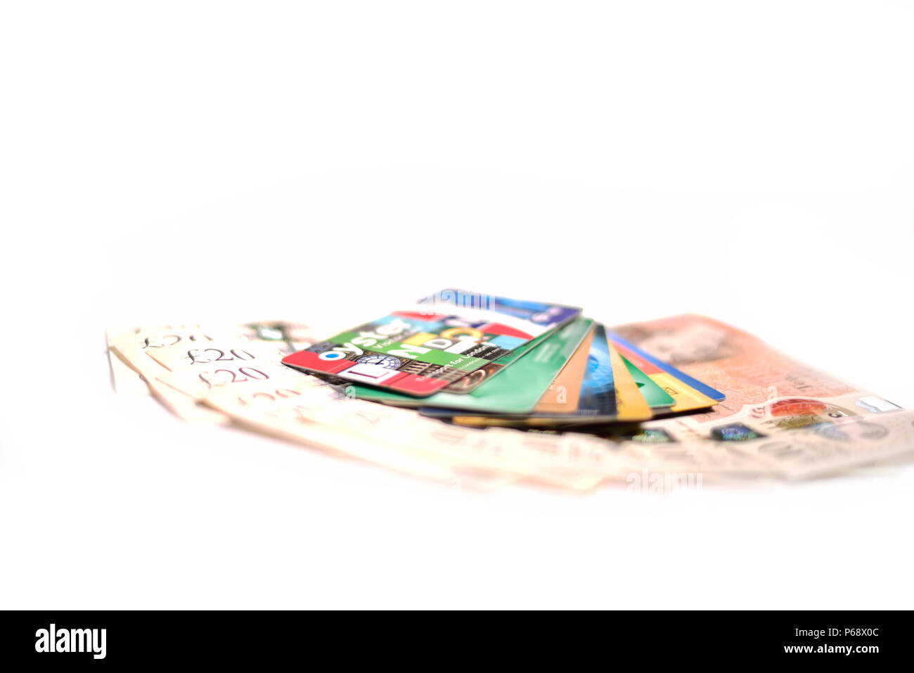 British pound, oyster card and credit card on white background Stock ...