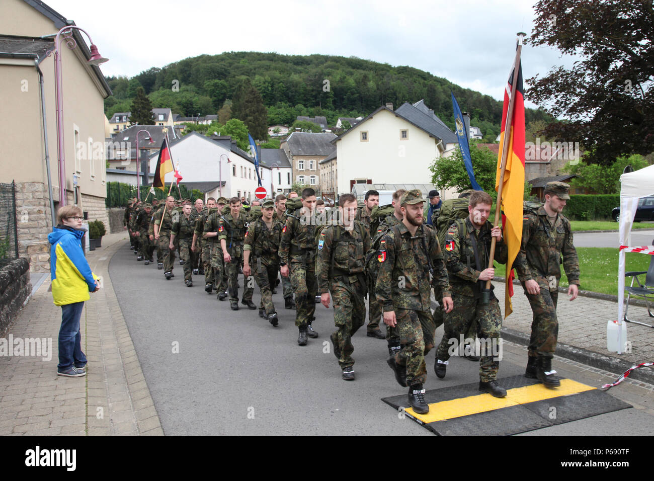 German soldiers cross a checkpoint during the 49th Annual Marche ...
