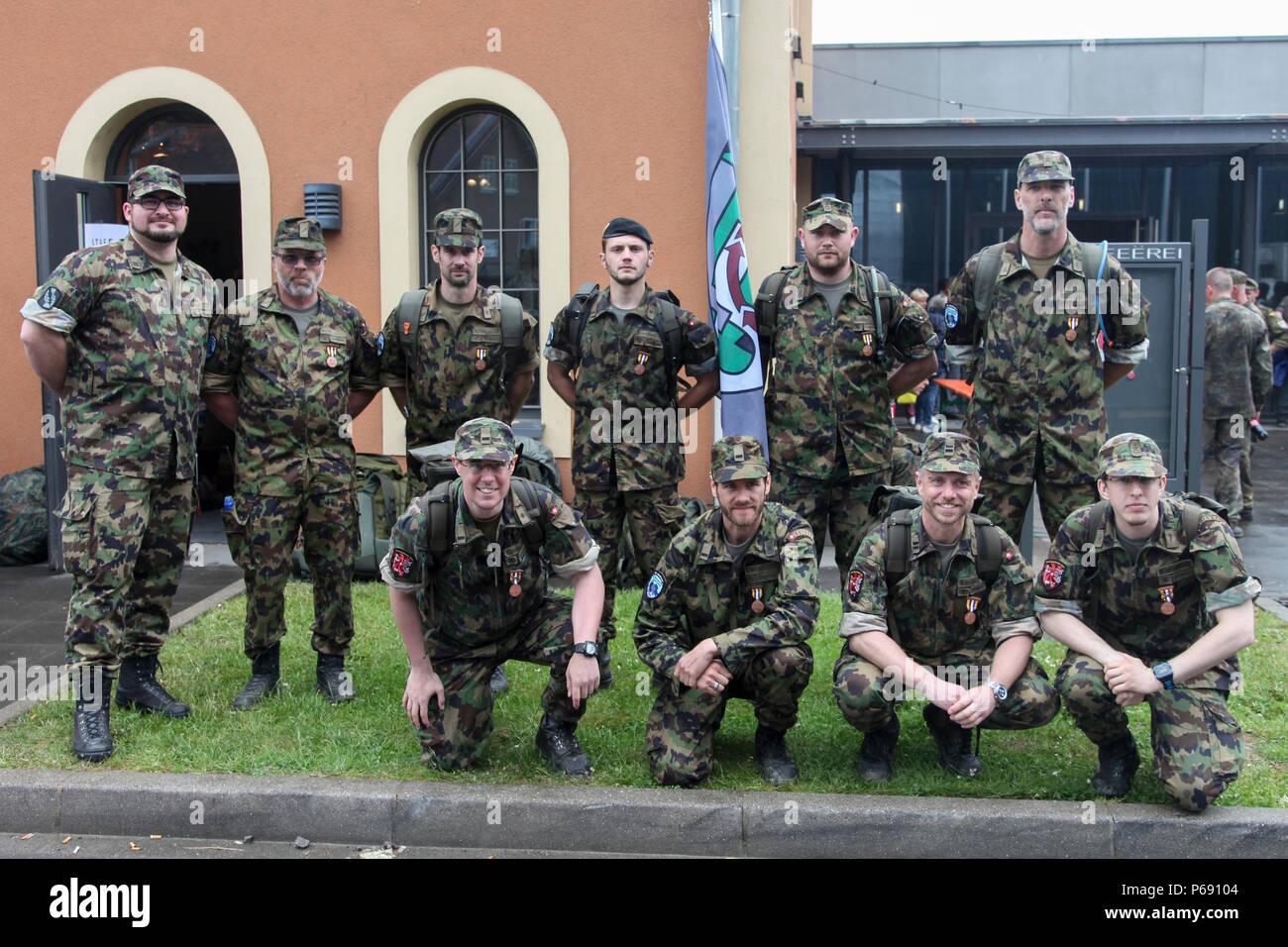 Swiss military members pose for a photo after the 49th Annual Marche ...