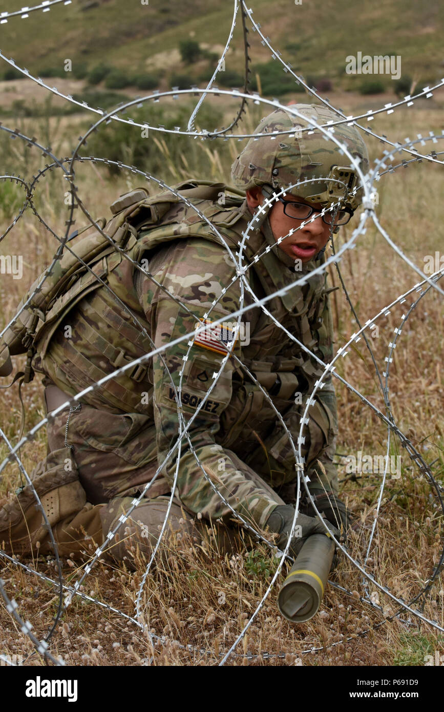 U.S. Army Pfc. Samuel Vasquez, a combat engineer with A Company, 54th ...