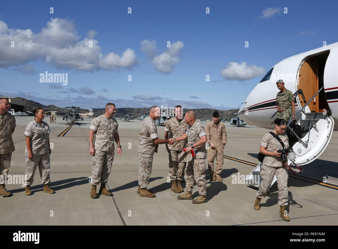 The Commandant of the Marine Corps Gen. Robert B. Neller, greets Col ...
