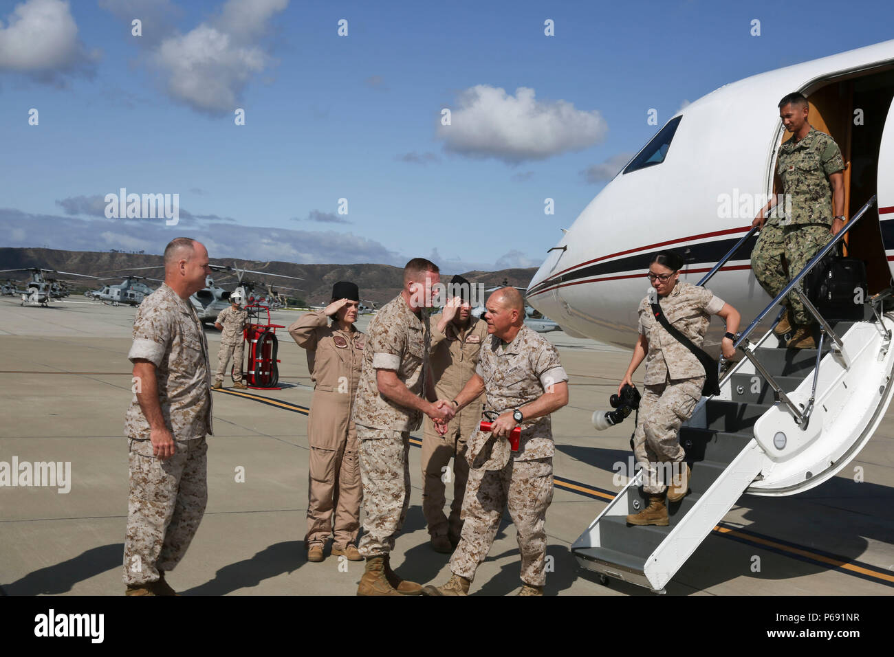 The Commandant of the Marine Corps Gen. Robert B. Neller, greets Brig ...