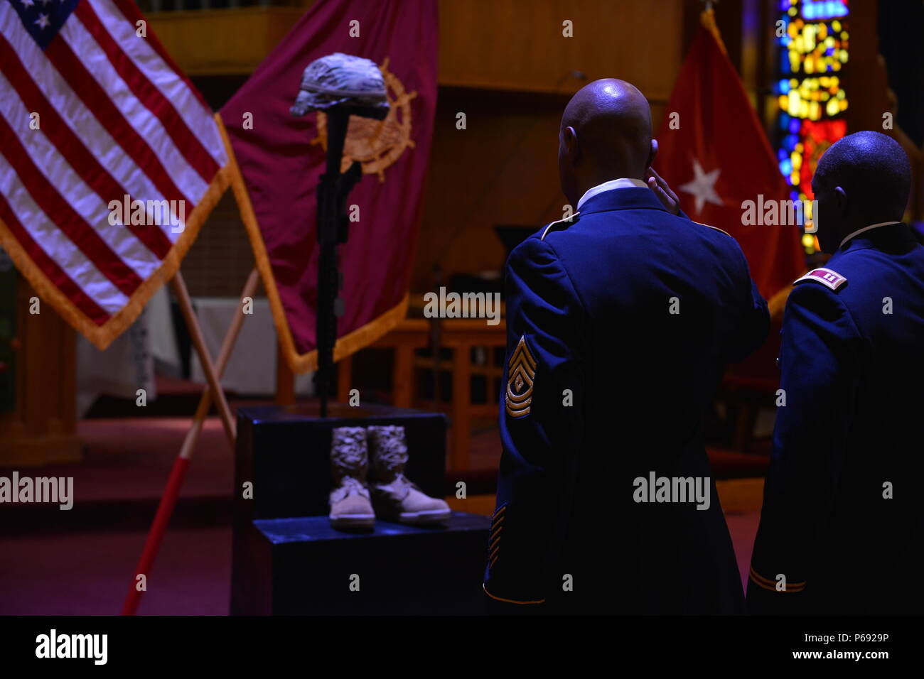U.S. Army Soldiers salute the battlefield cross during the U.S. Army ...