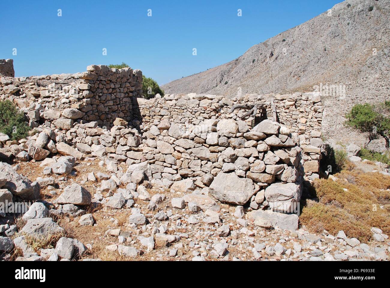 The remains of the abandoned village of Gera on the Greek island of ...