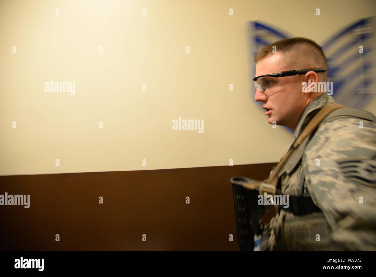 Staff Sgt. Kyle Hart, 51st Security Forces Squadron patrolman, searches ...