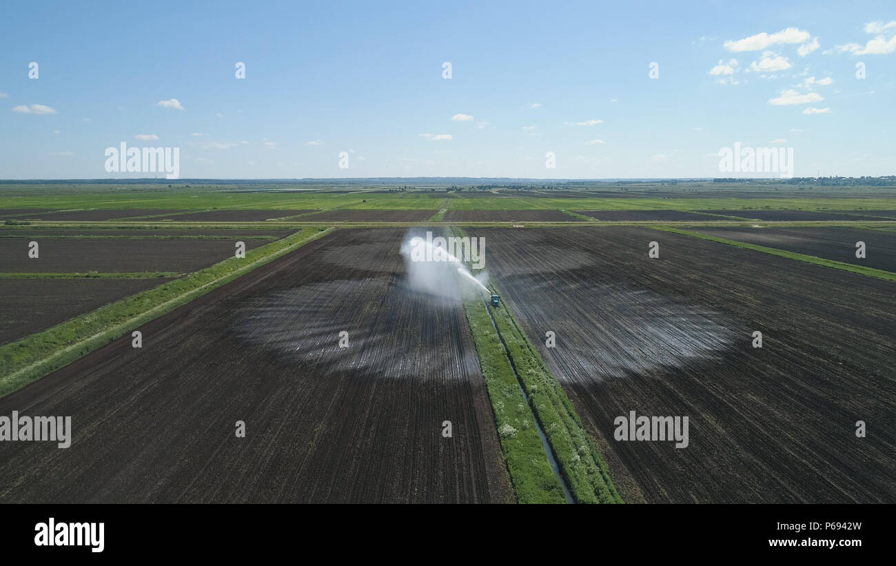 Aerial view of Crop Irrigation using the center pivot sprinkler system ...