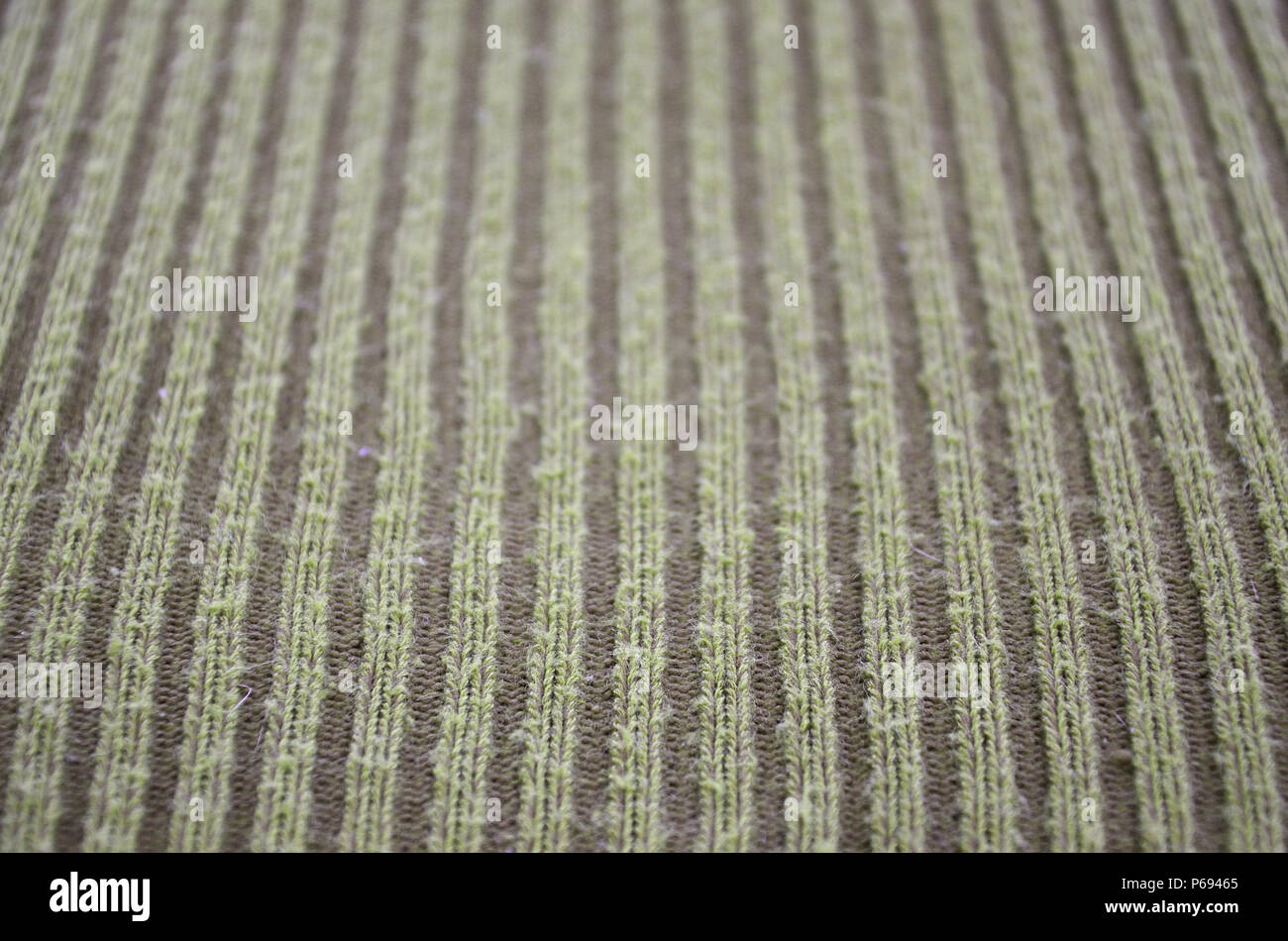 The texture of a knitted sweater wallpaper. Woolen fabric for wallpaper ...