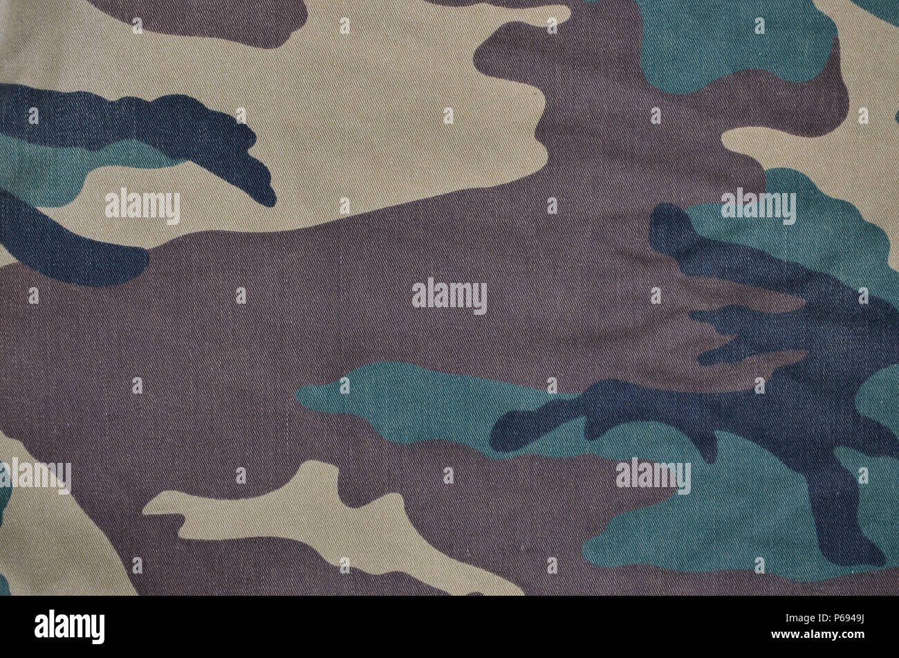 Texture of fabric with a camouflage painted in colors of the marsh ...