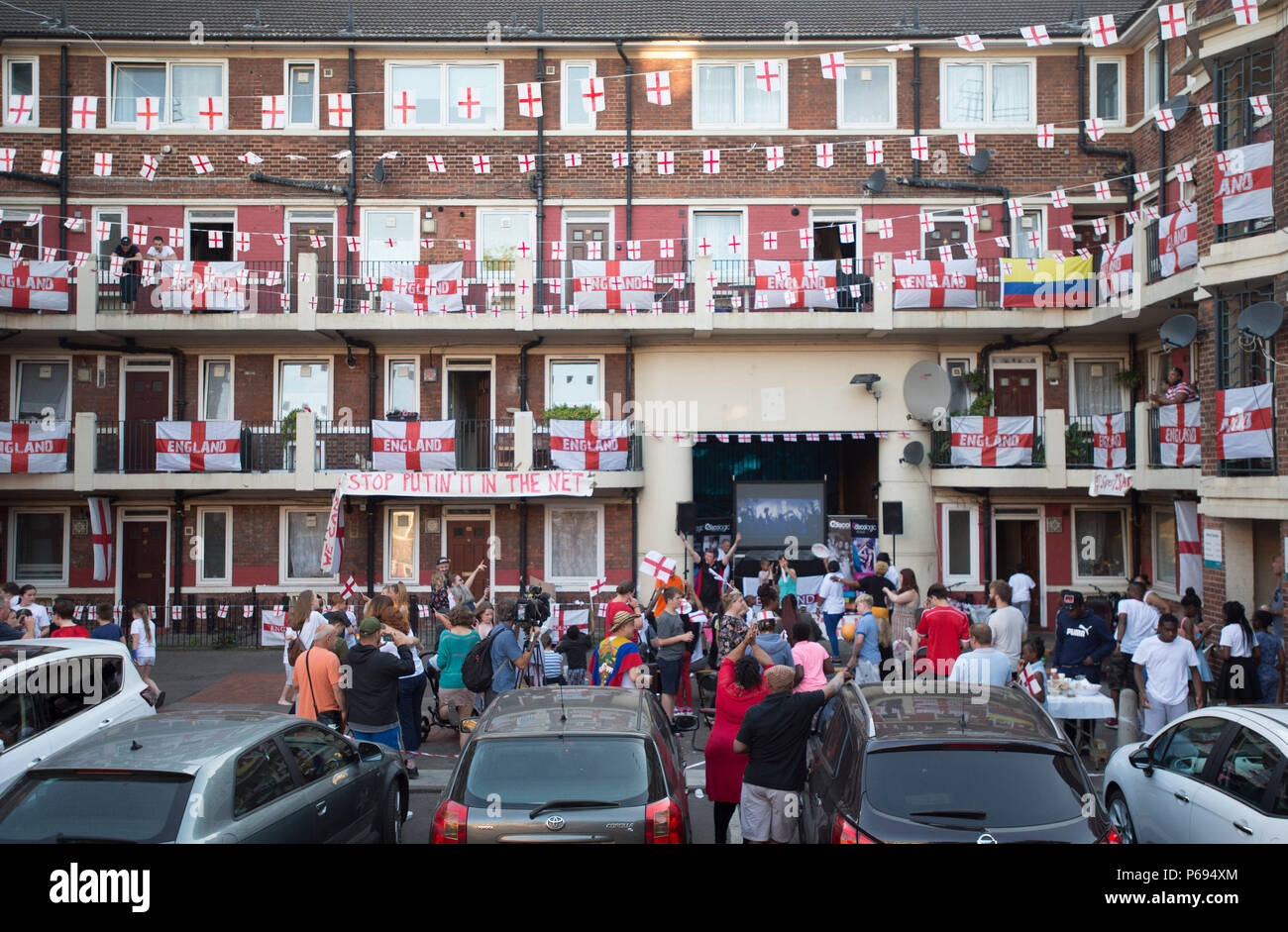 England fans at the Kirby Estate in Bermondsey, London during half time ...