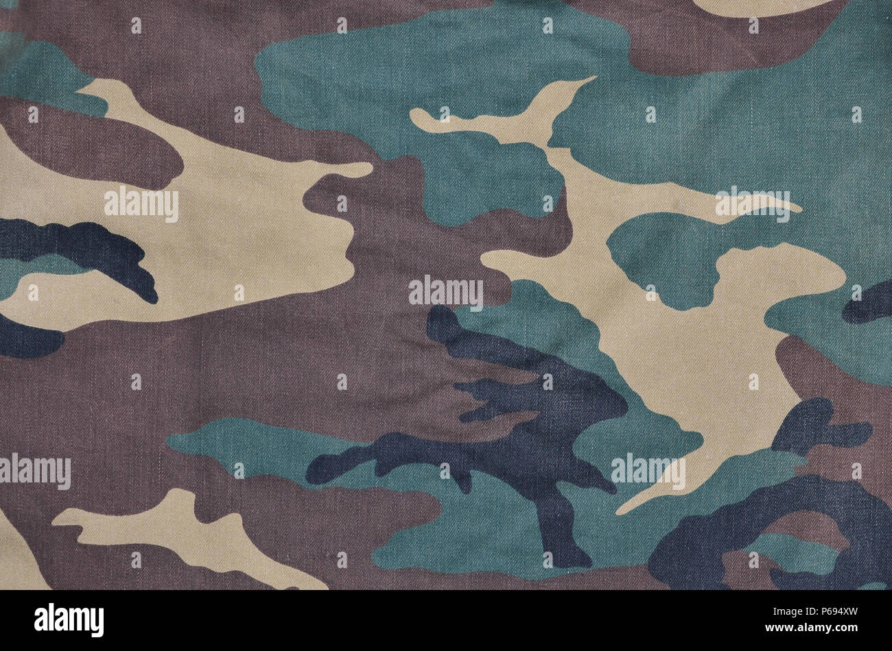 Texture of fabric with a camouflage painted in colors of the marsh ...