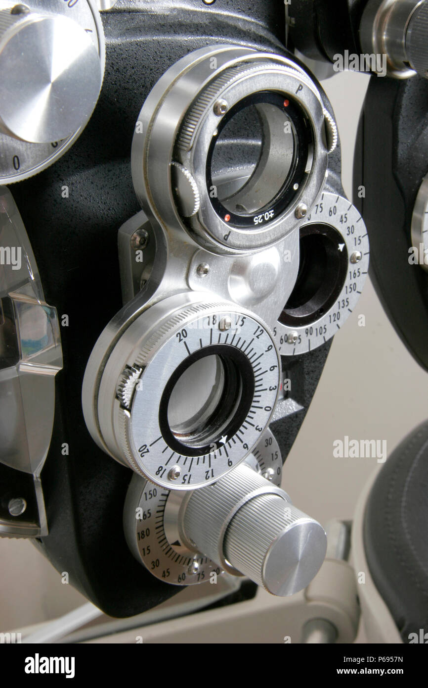 Vertical photo of a testing device used in an eye exam Stock Photo - Alamy