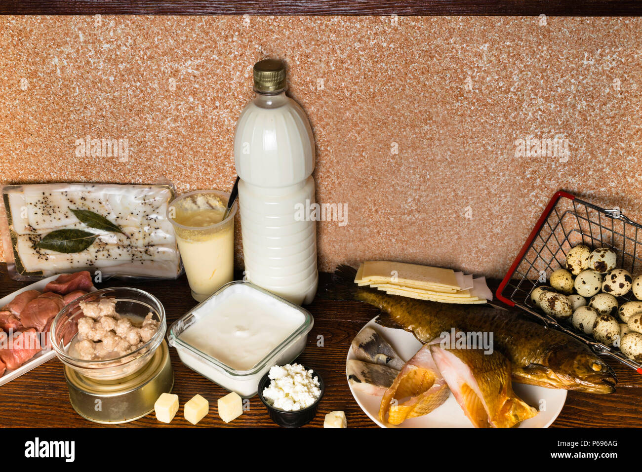 Animal protein food at dark wood table. Meat, chicken, beef, lard, fish ...