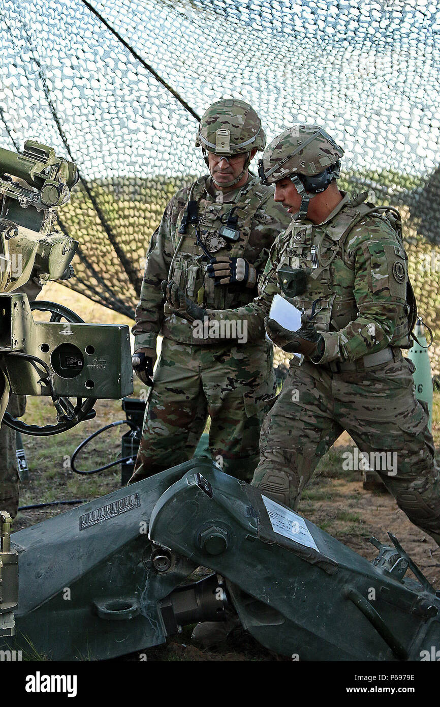 Brigadier General James Mingus (right), commander of the 4th Infantry ...
