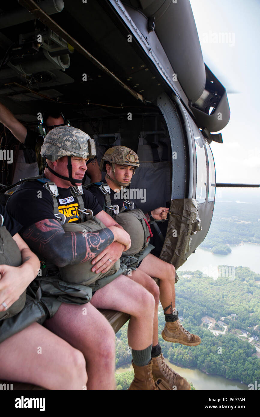 U.S. Army Rangers prepare to parachute from a UH-60 Black Hawk into ...