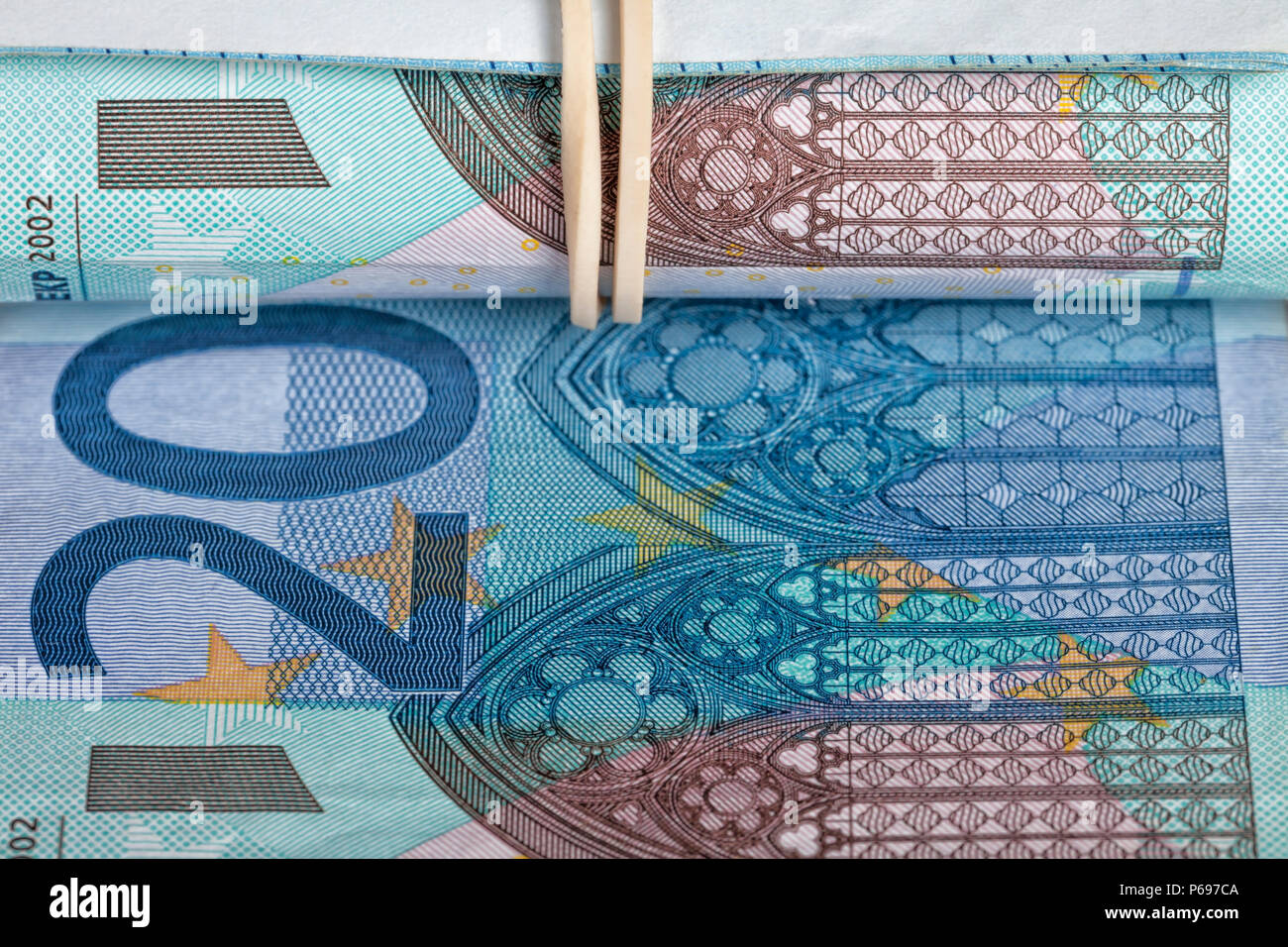 Bills euro rolled up hi-res stock photography and images - Alamy