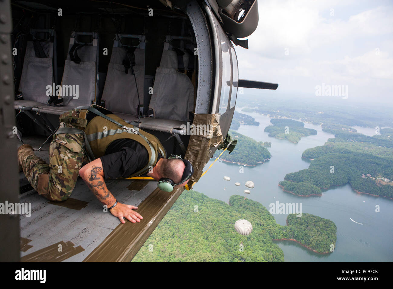 A U.S. Army Ranger Jumpmaster checks to the rear of a UH-60 Black Hawk ...