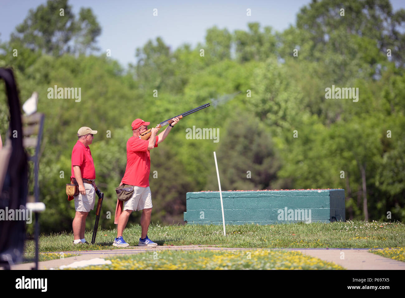 USMC (Retired) Skeet team member, CWO5 Kevin Suitt shoots skeet as ...