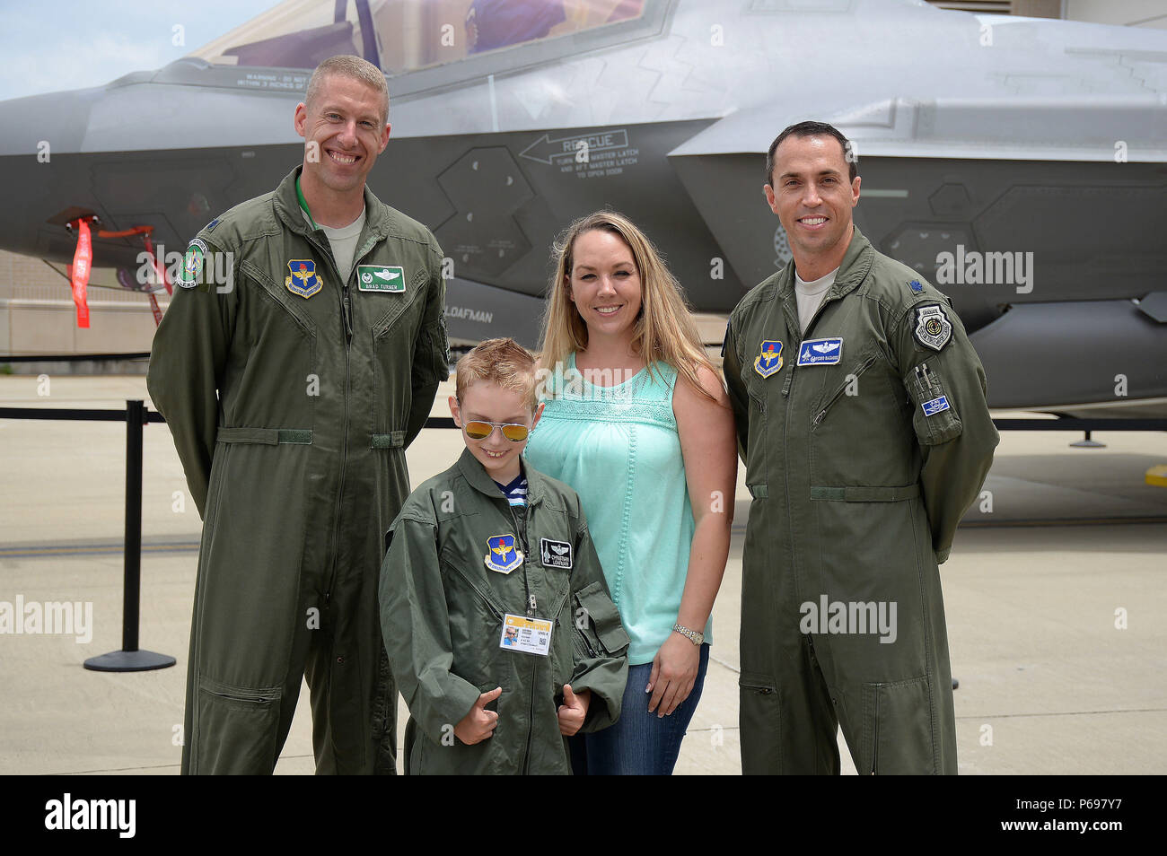 Pilot for a Day, Christian “the Natural” Loafman (center), stands in ...
