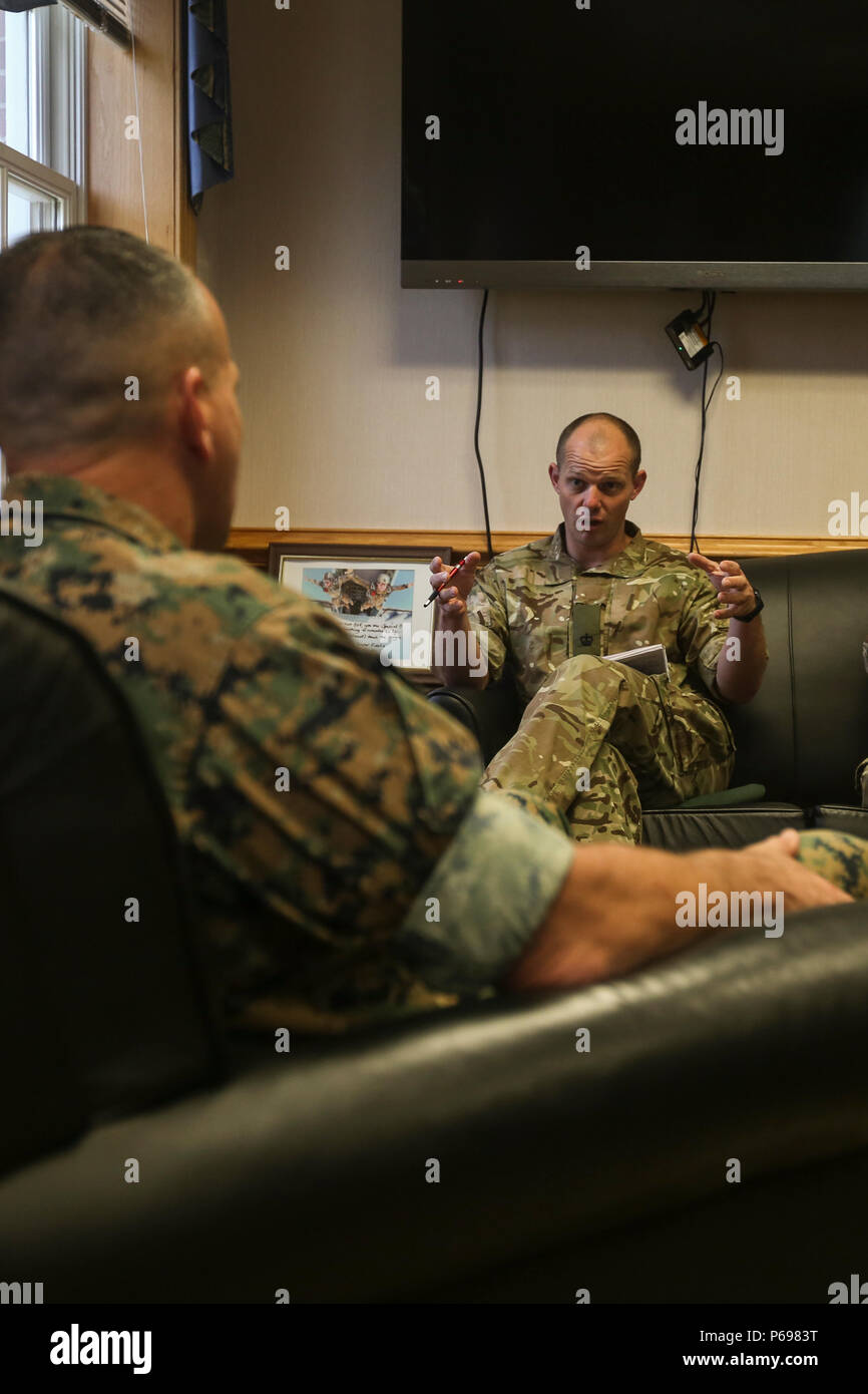 Maj. Neil Whitehead sits with Brig. Gen. Charles Chiarotti, commanding ...
