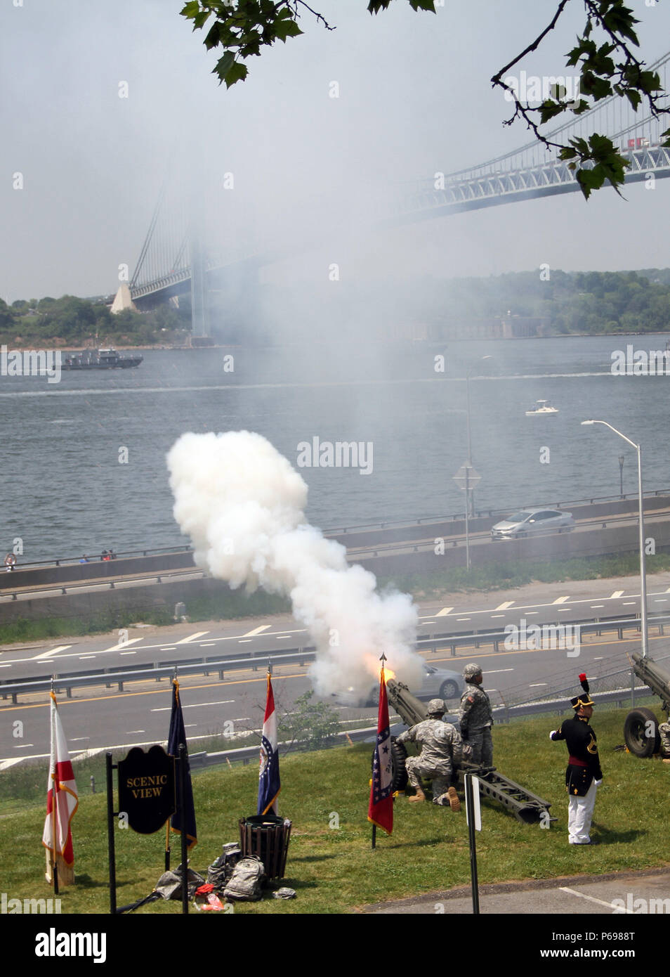Fort Hamilton artillery battery fires a salute to ships passing under ...