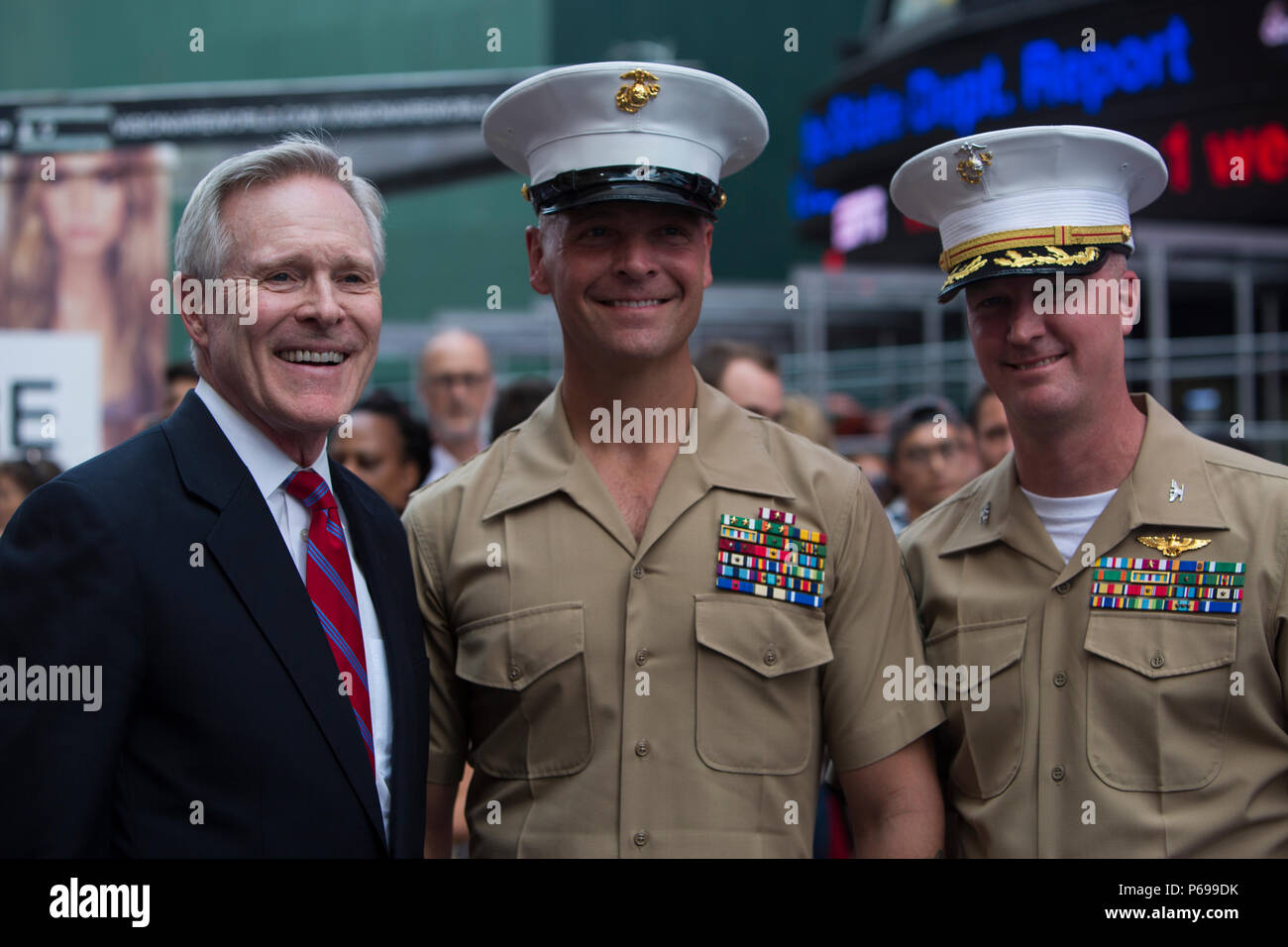 Secretary of the Navy Ray Mabus poses for a photo with a Col. Ryan ...