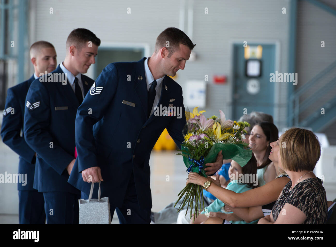 Family members of U.S. Air Force Lt. Col. Matthew Jones, outgoing ...