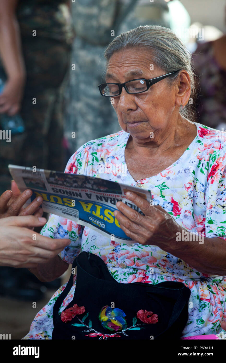 Patient is examined for glasses at the medical readiness exercise in La ...