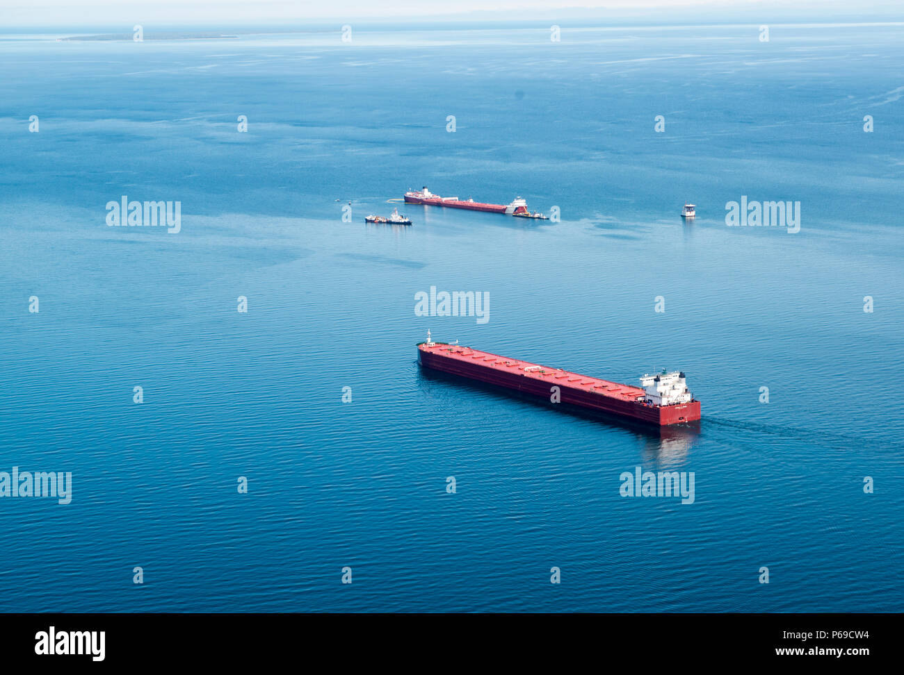 The motor vessel Edgar B. Speer safely passes the safety zone around ...