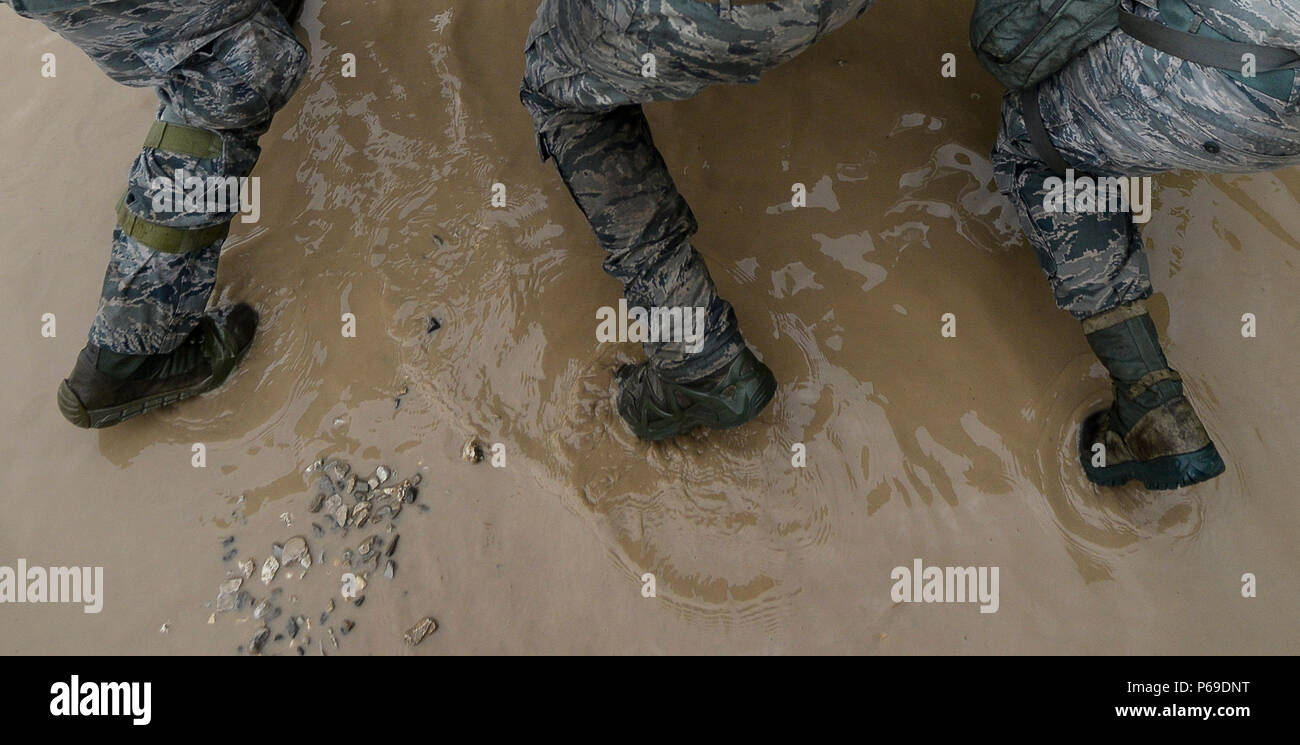 Airmen assigned to the 31st Security Forces Squadron, push a Humvee ...