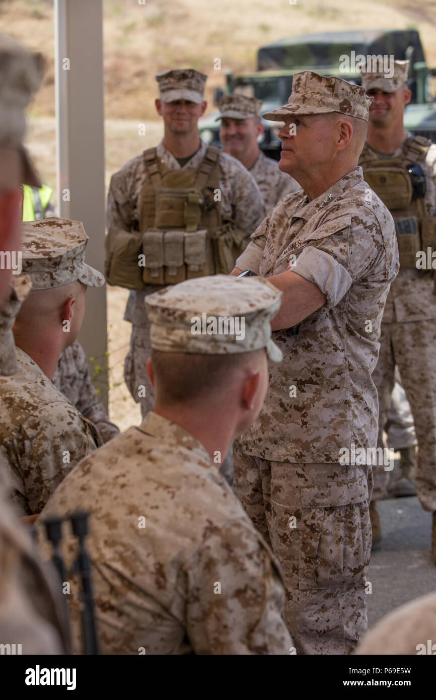General Robert Neller, the Commandant of the Marine Corps, takes a knee ...