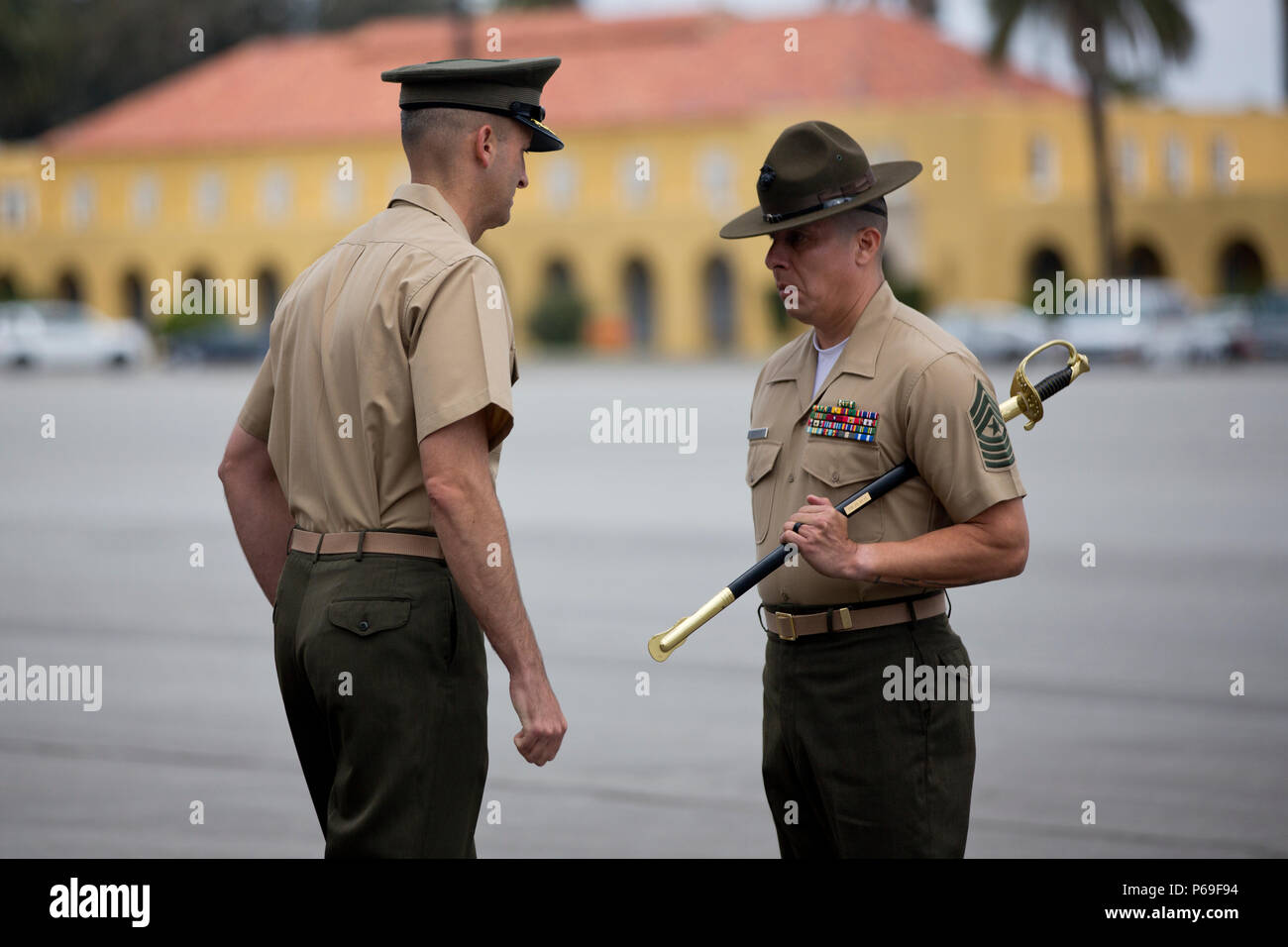 U.S. Marine Corps Lt. Col. Jared C. Voneida, left, commanding officer ...