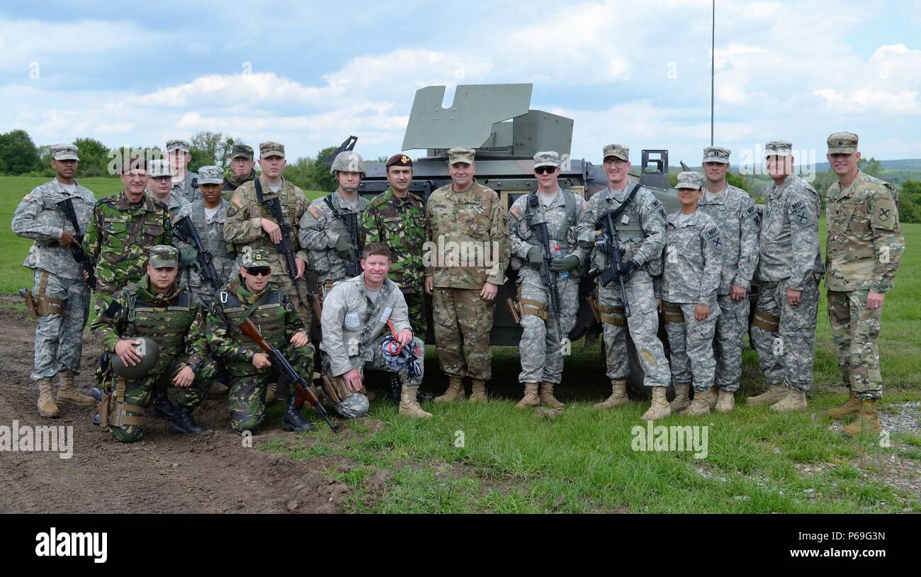 Front row, from left to right: Pvt. Alexandru Spelanu and Sgt. 1st ...