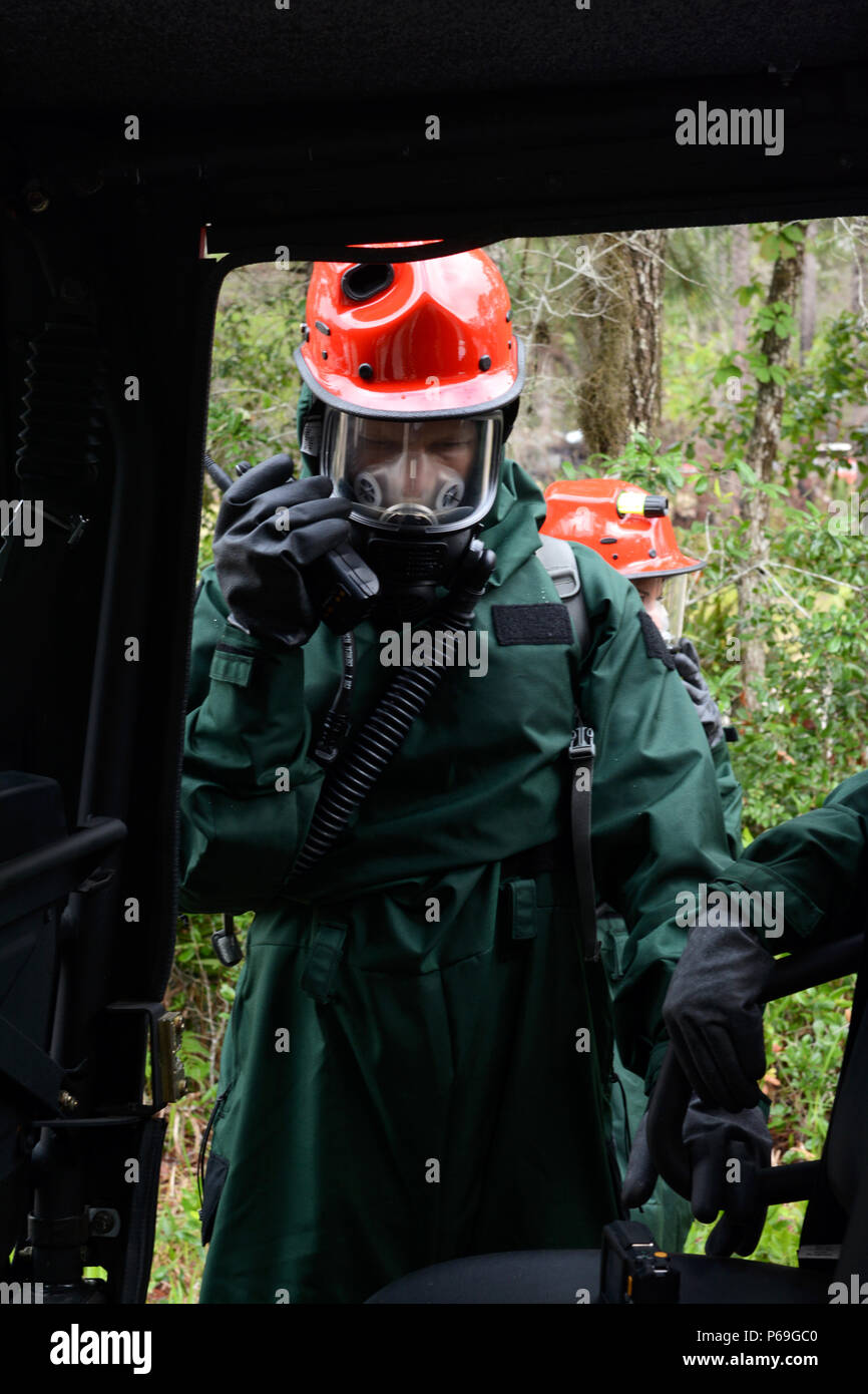 U.S. Air Force Staff Sgt. Jesse Sandvich radios in a status of his ...