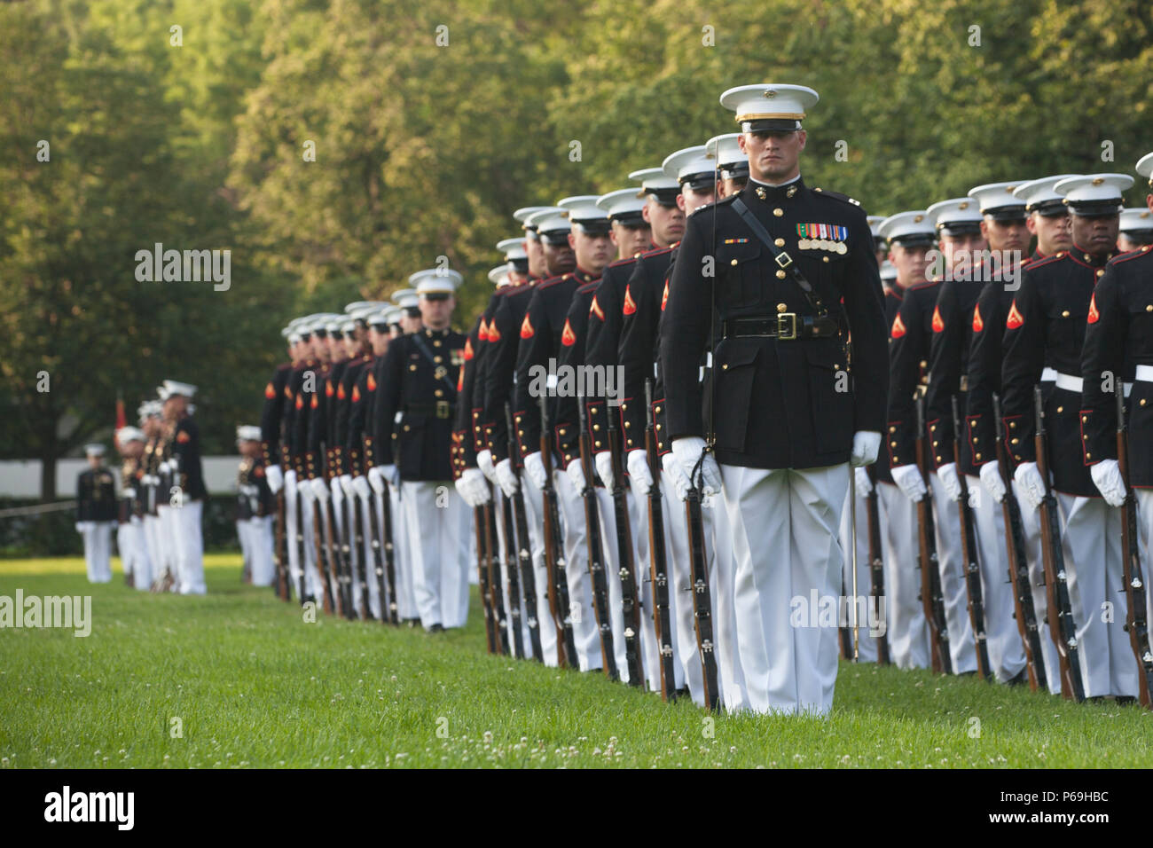U.S. Marines with Marine Barracks Washington perform during a sunset ...
