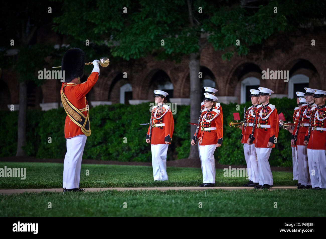 The "Presidents Own" U.S. Marine Band performs during an evening parade ...