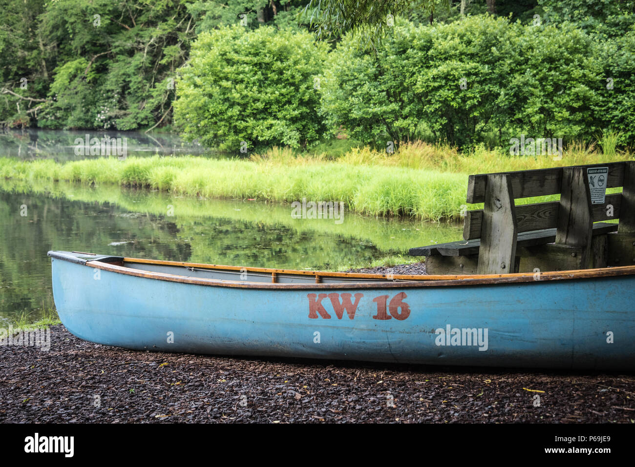 Blue canoe at Lake Trahlyta in Vogel State Park, nestled in the Blue ...