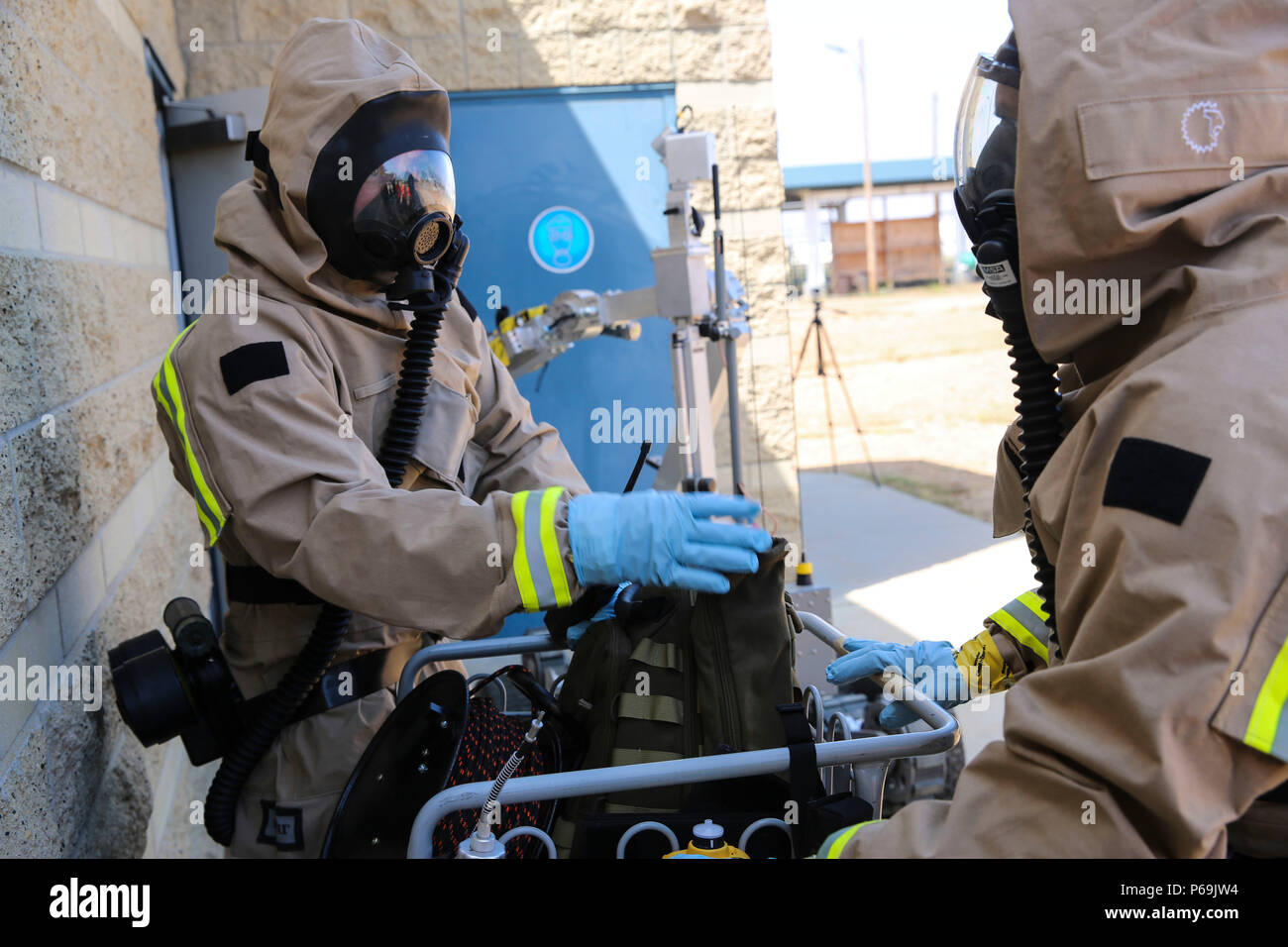 Marines with Explosive Ordnance Disposal gather their gear before ...