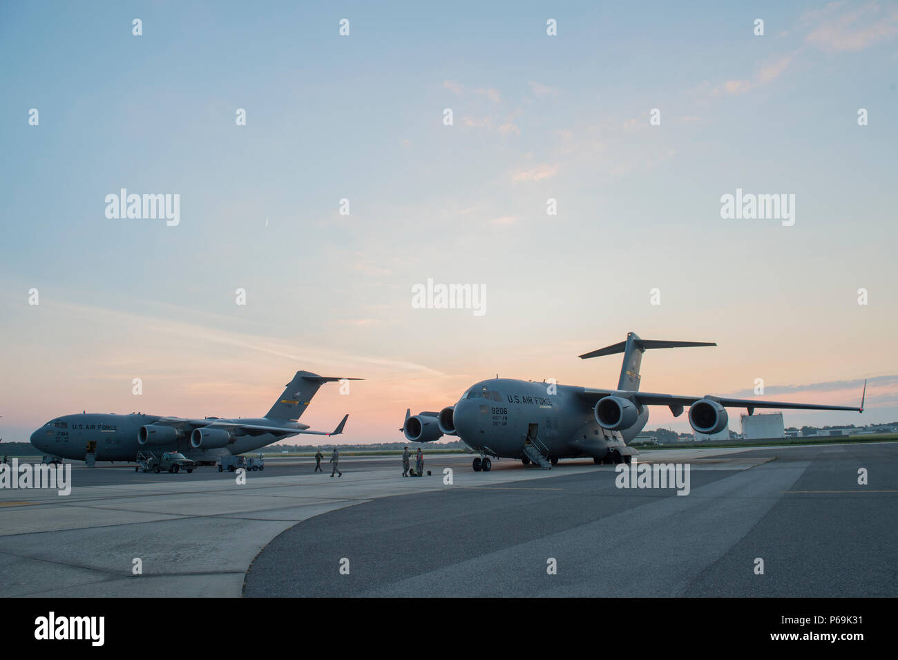 U.S. Air Force C-17 Globemaster IIIs sit on the Military Ramp prior to ...