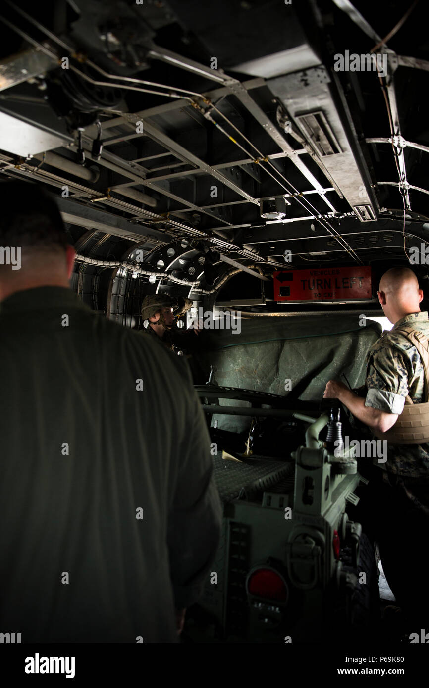 U.S. Marines assigned to Marine Heavy Helicopter Squadron (HMH) 464 and ...