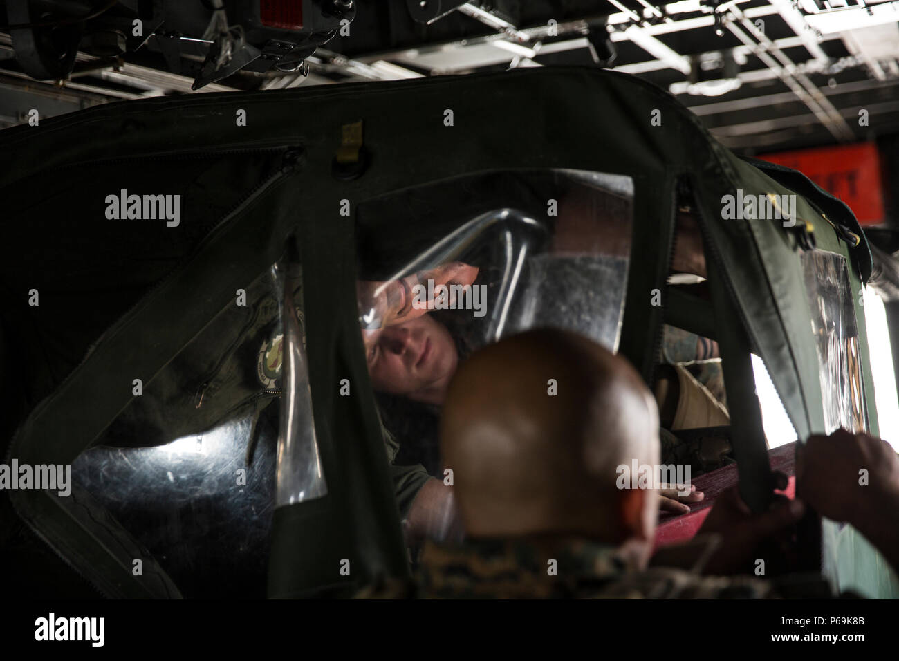 U.S. Marines assigned to Marine Heavy Helicopter Squadron (HMH) 464 ...