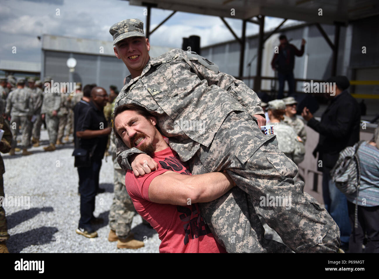 UFC fighter Tim Kennedy demonstrates a move at Camp Bondsteel, Kosovo ...