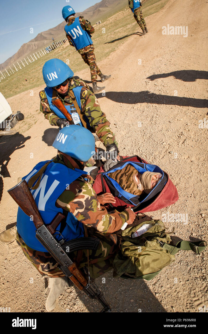 Bangladesh Army Soldiers treat a simulated casualty during lane ...