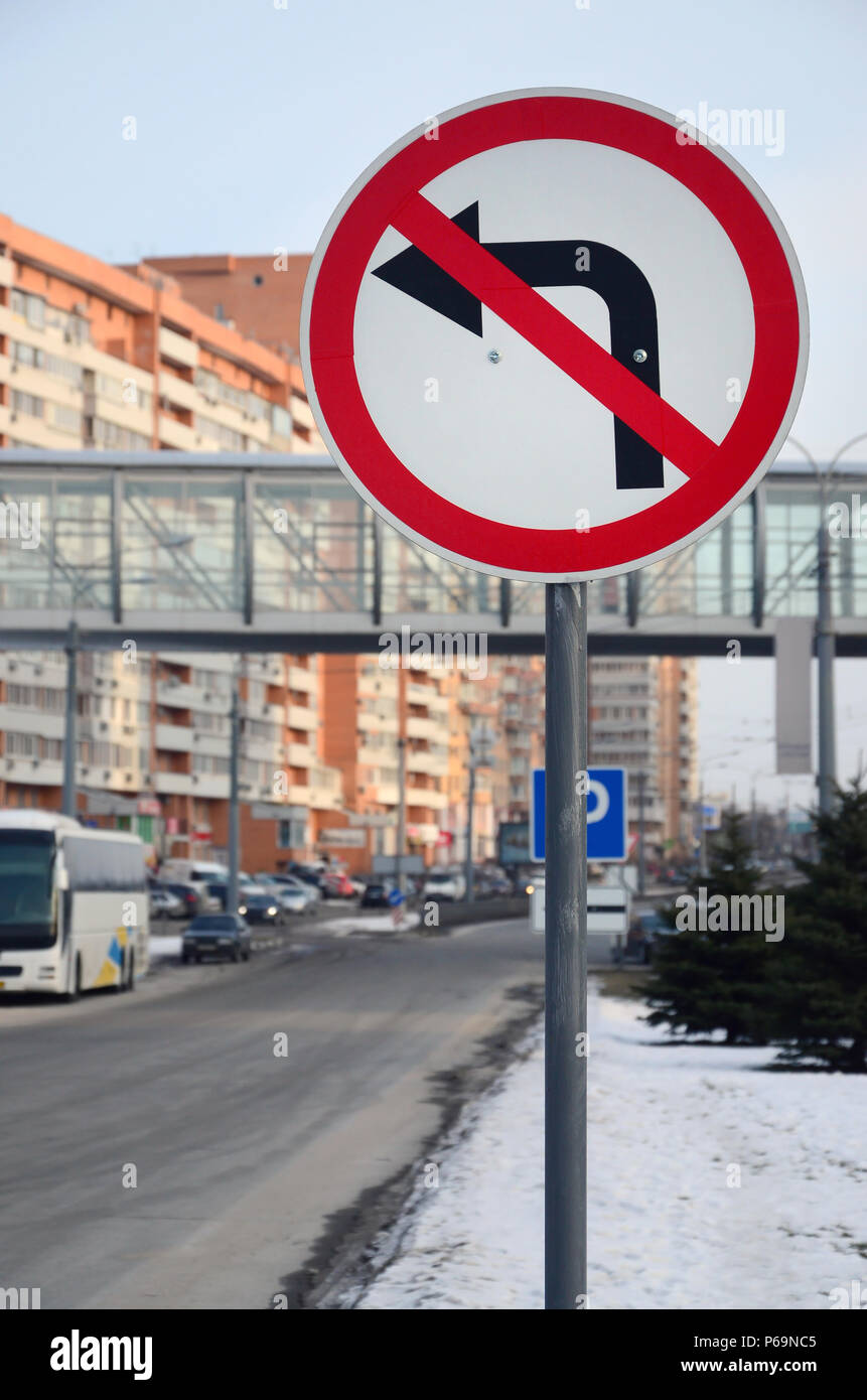 Turn left is prohibited. Traffic sign with crossed out arrow to the ...