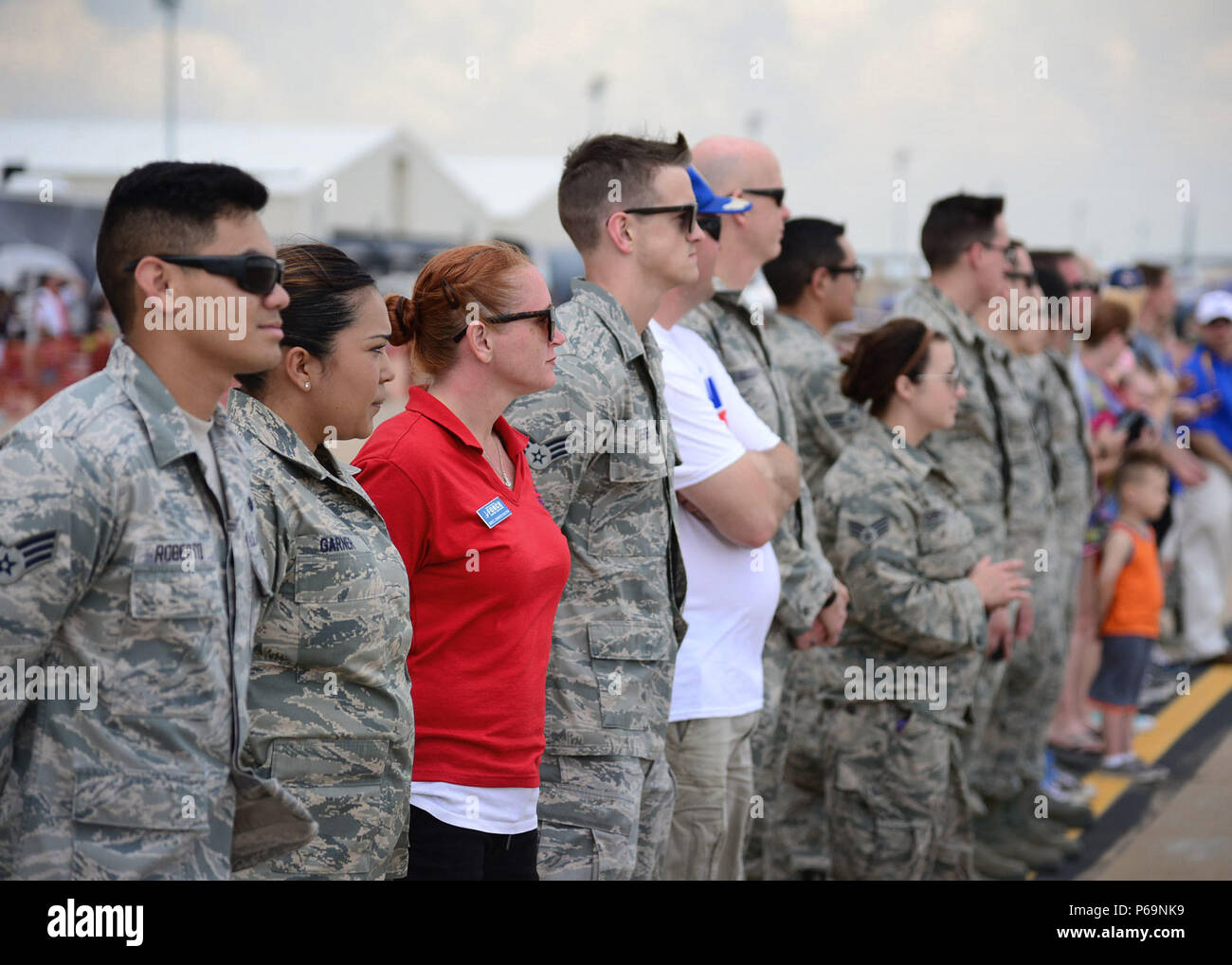 Members of Team Cannon proudly watch as their teammates are honored by ...