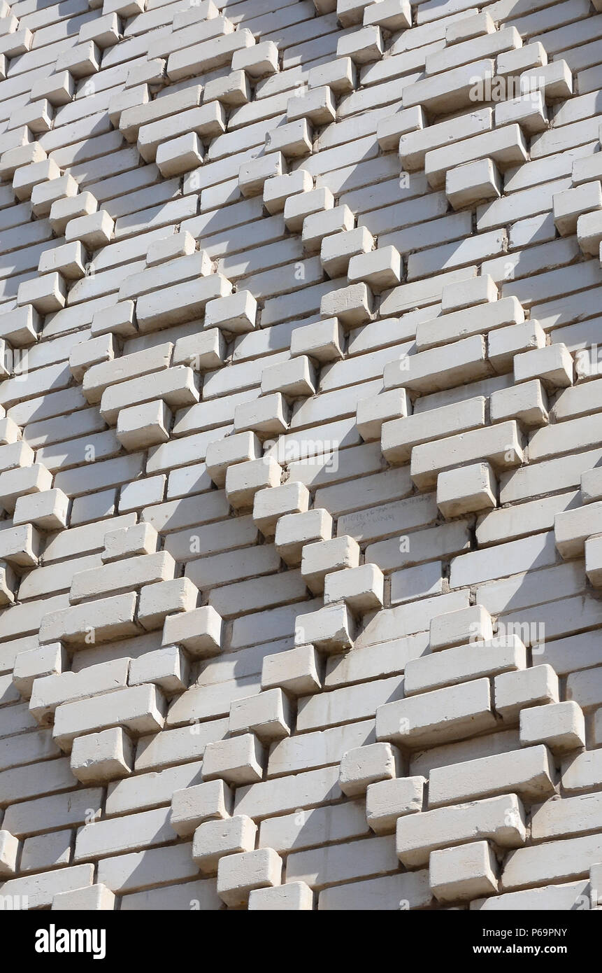 A pattern made of white bricks in the form of diamond shapes ...