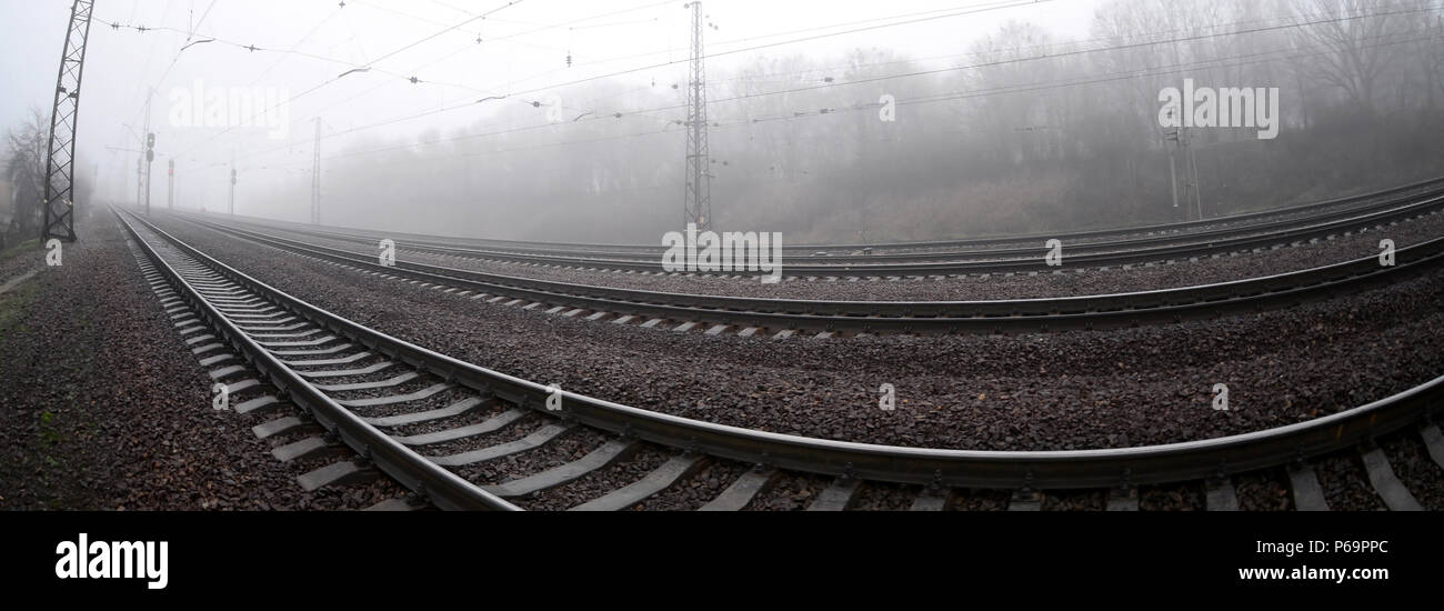Rail tracks in misty forest hi-res stock photography and images - Alamy