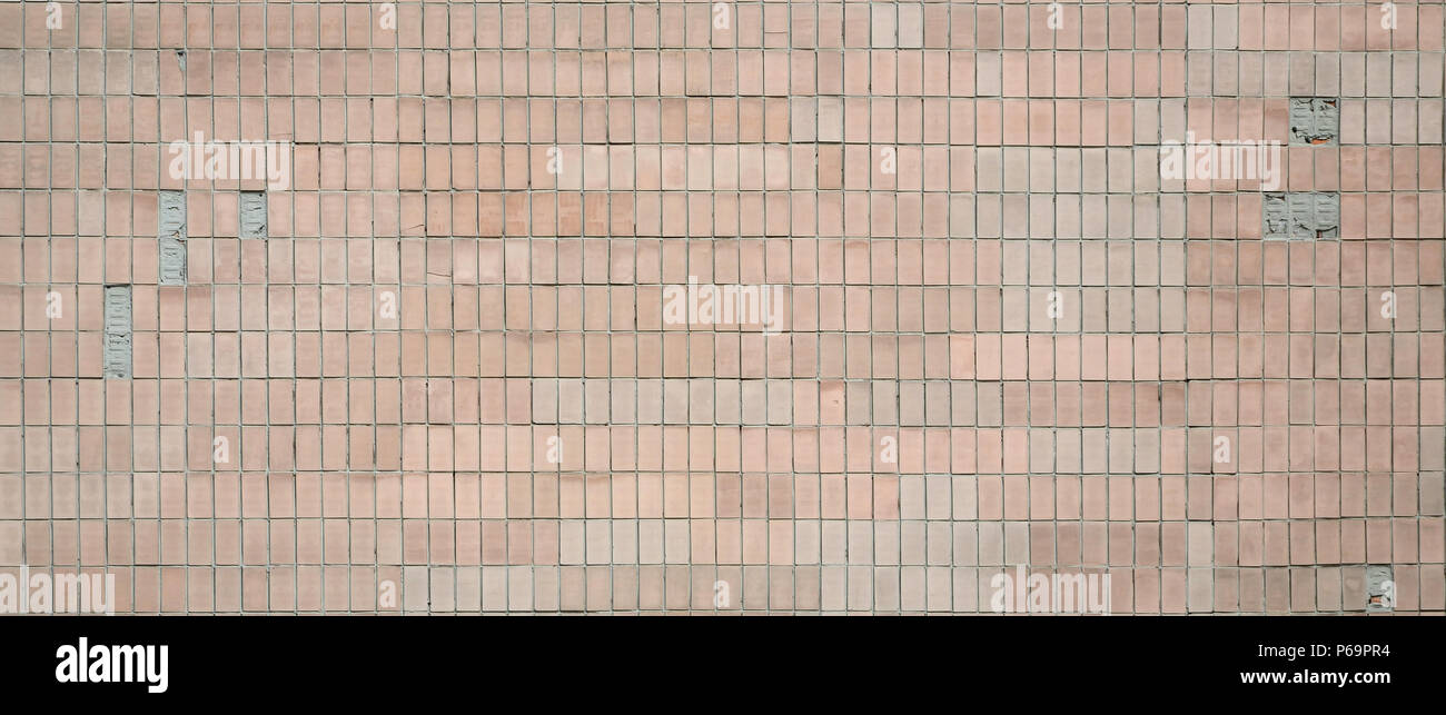 Old Soviet beige wall tiles. The texture of the classical outer tile ...