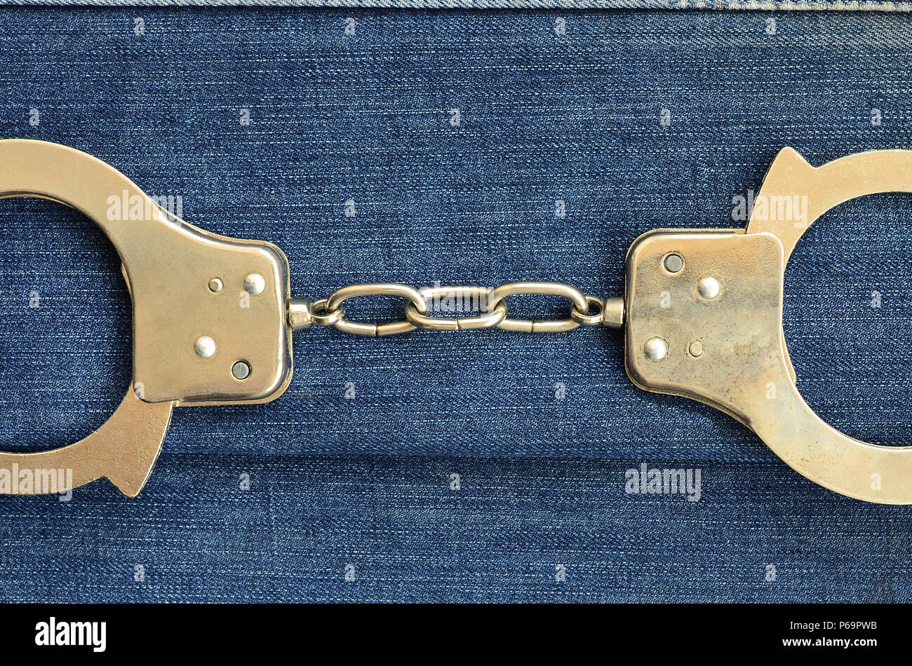 Real police handcuffs hi-res stock photography and images - Alamy