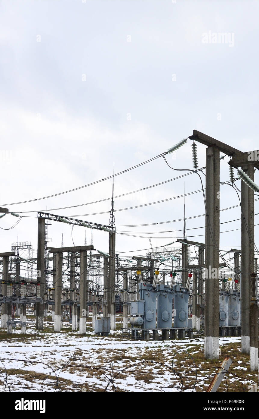 Power plant is a station of transformation. A lot of cables, poles and ...